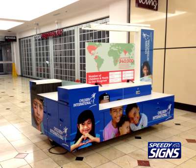 Speedy Signs | Kiosk Wrap and Visual Design
